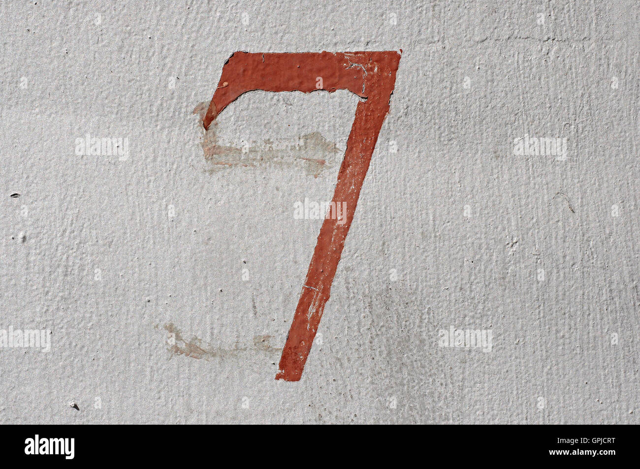 7 - old brown handwritten number over grunge silver background Stock ...