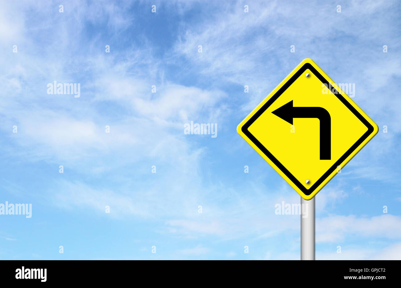 Road Sign - Left Turn Warning with blue sky Stock Photo - Alamy