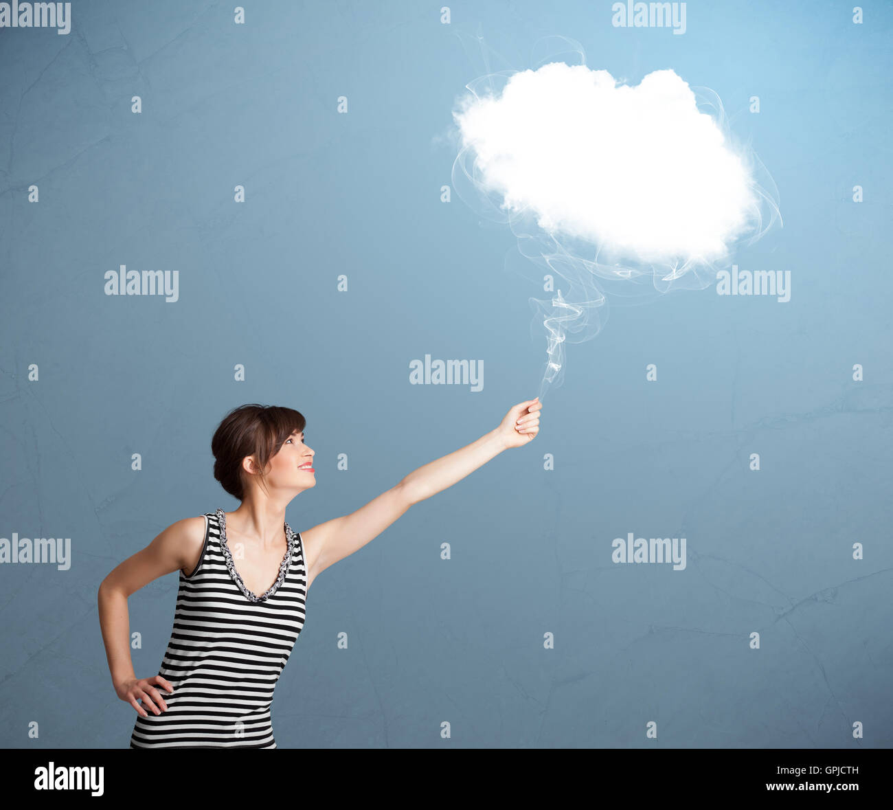 Beautiful lady holding cloud Stock Photo - Alamy