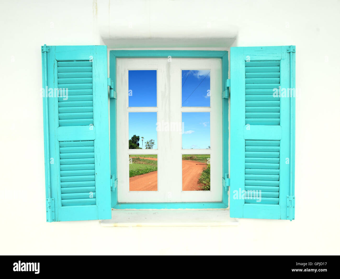 Greek style windows with soil curve road Stock Photo - Alamy