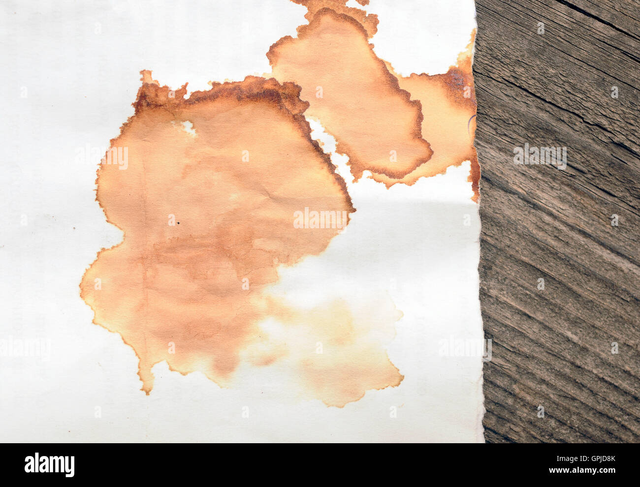 dirty paper on old wooden background Stock Photo - Alamy