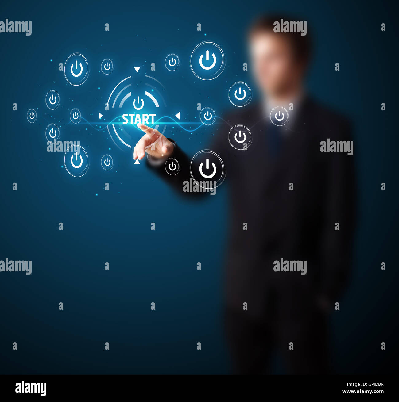 Businessman pressing simple type of start buttons Stock Photo - Alamy