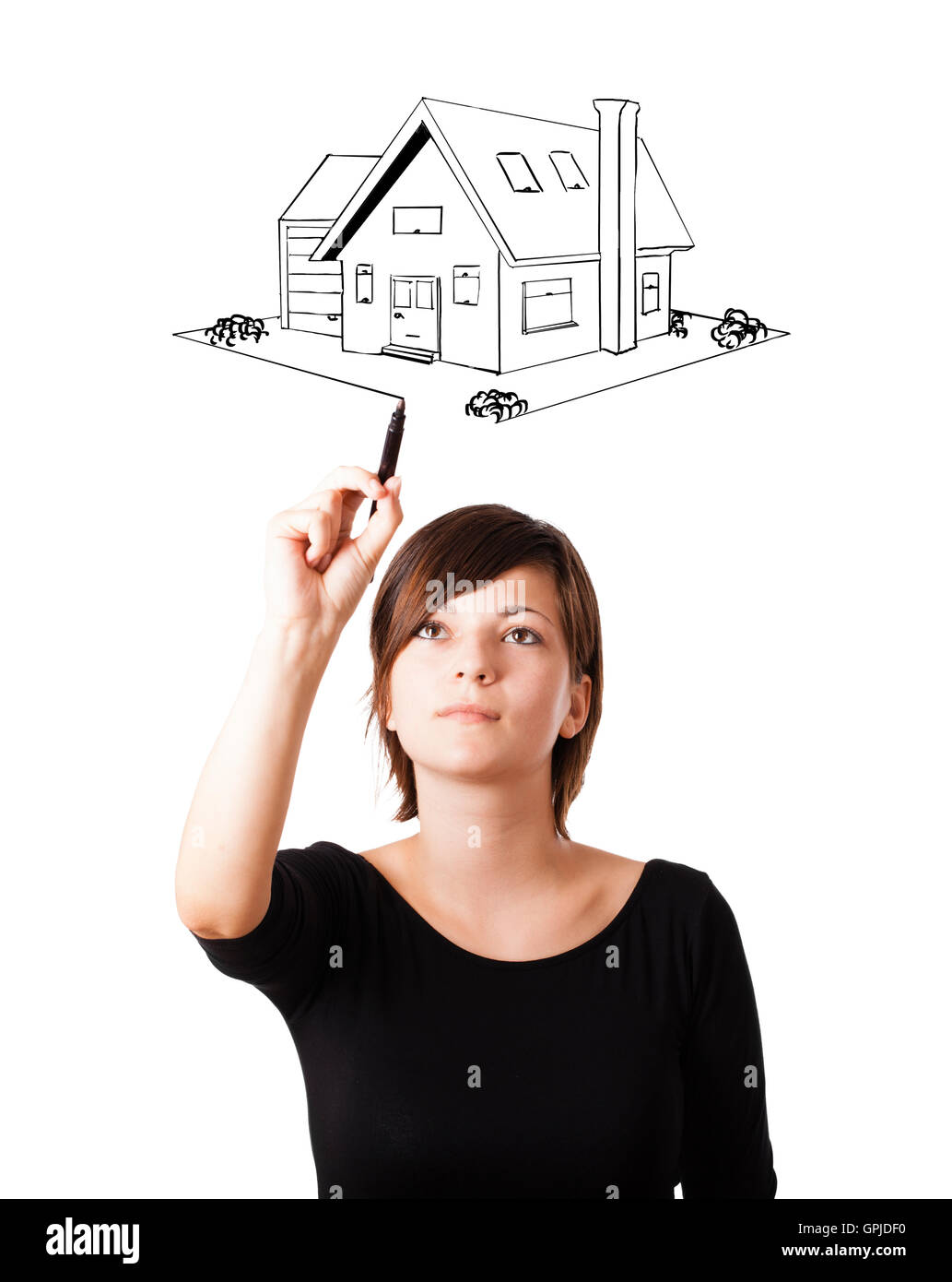 Young woman drawing a house on whiteboard Stock Photo - Alamy