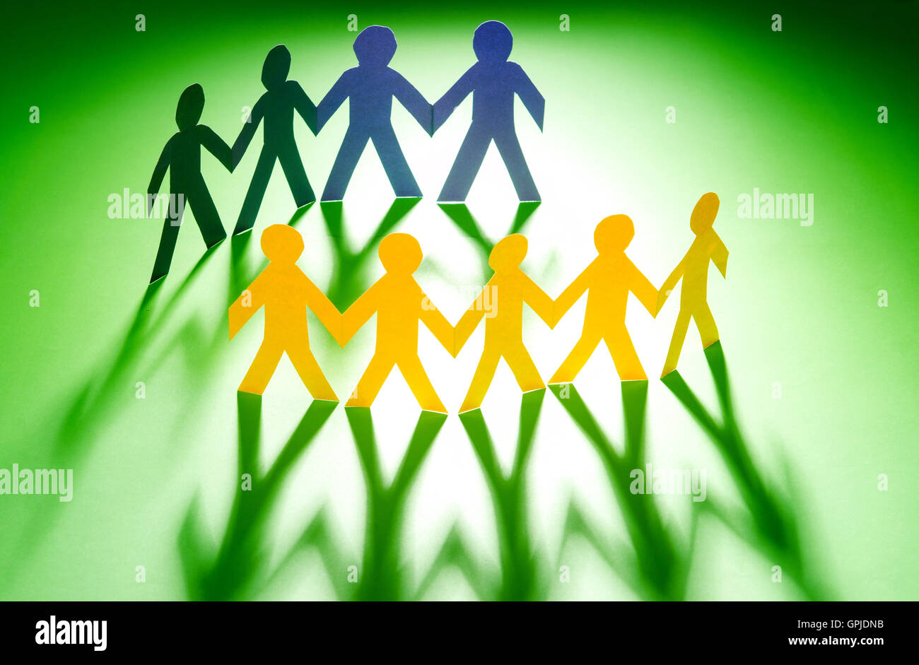 Paper people in teamworking concept Stock Photo - Alamy