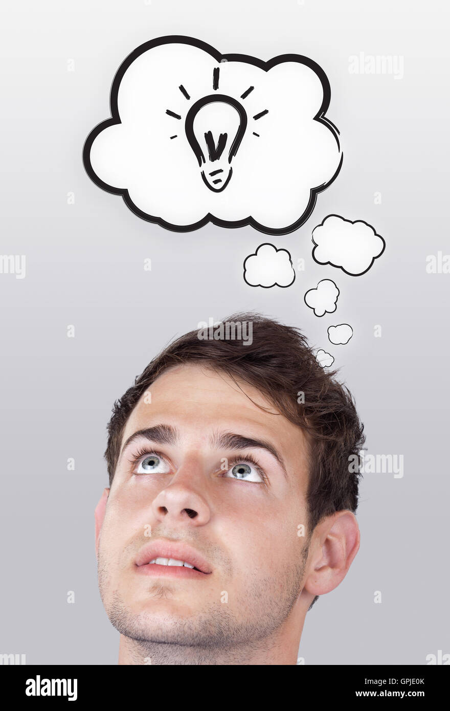 Young head thinking with clouds Stock Photo - Alamy