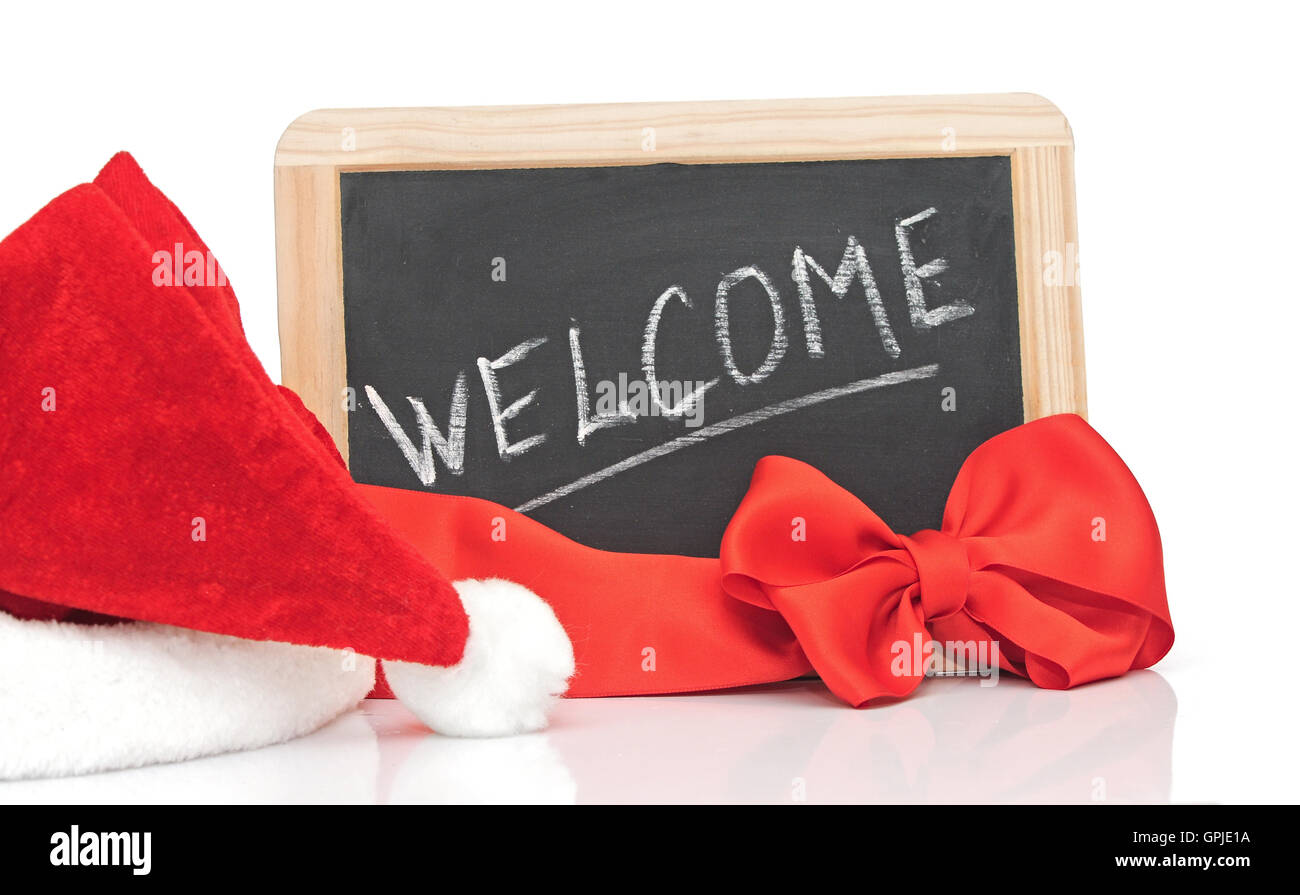 word "welcome" and santa hat on small blackboard Stock Photo - Alamy