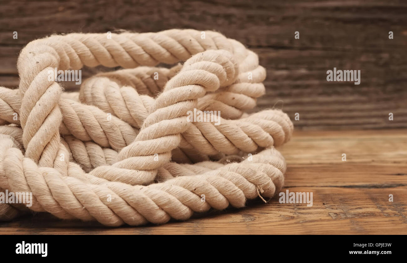 ship ropes borders on wood background texture Stock Photo - Alamy