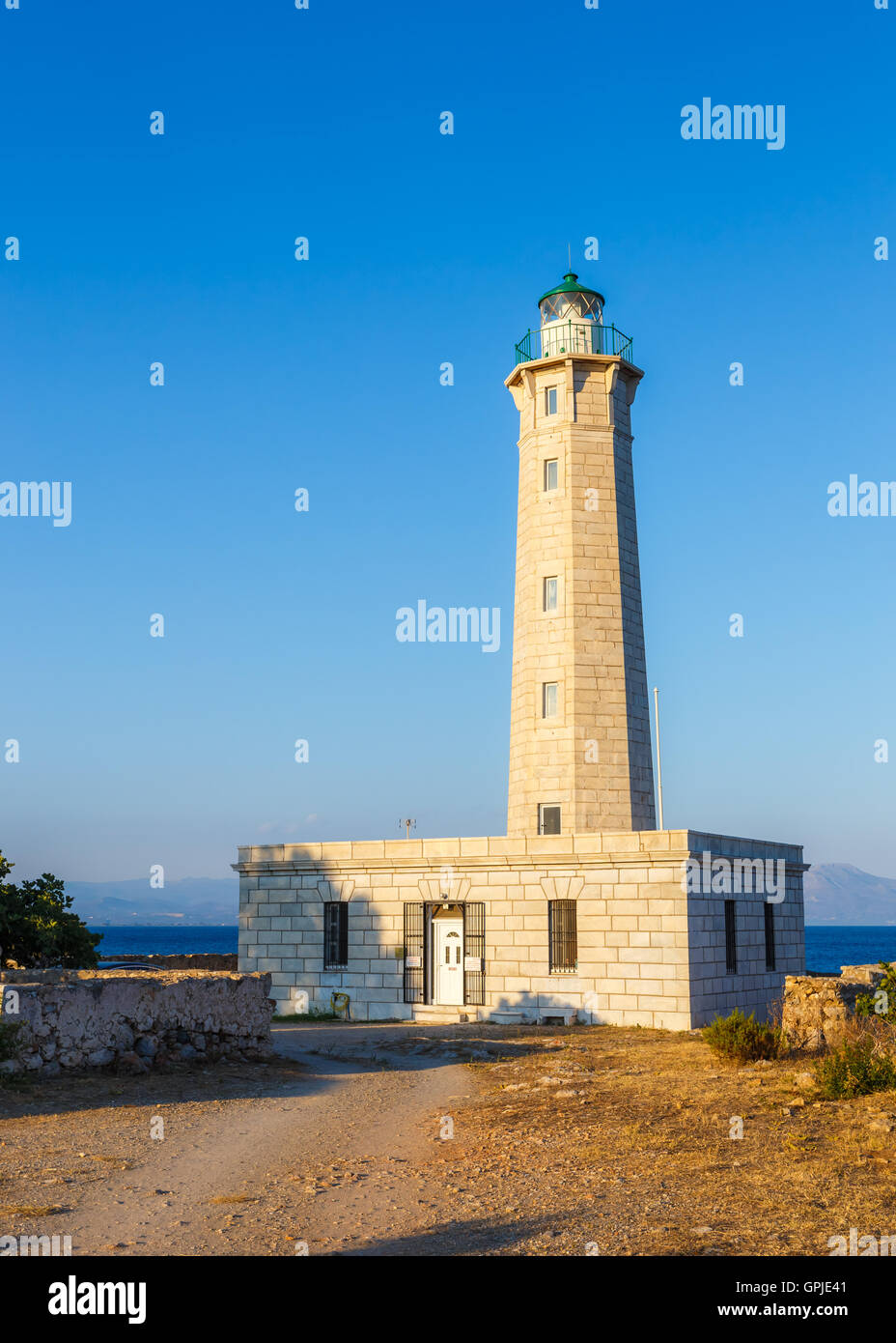 Lighthouse near Gythio in the afternoon against a blue sky Stock Photo ...