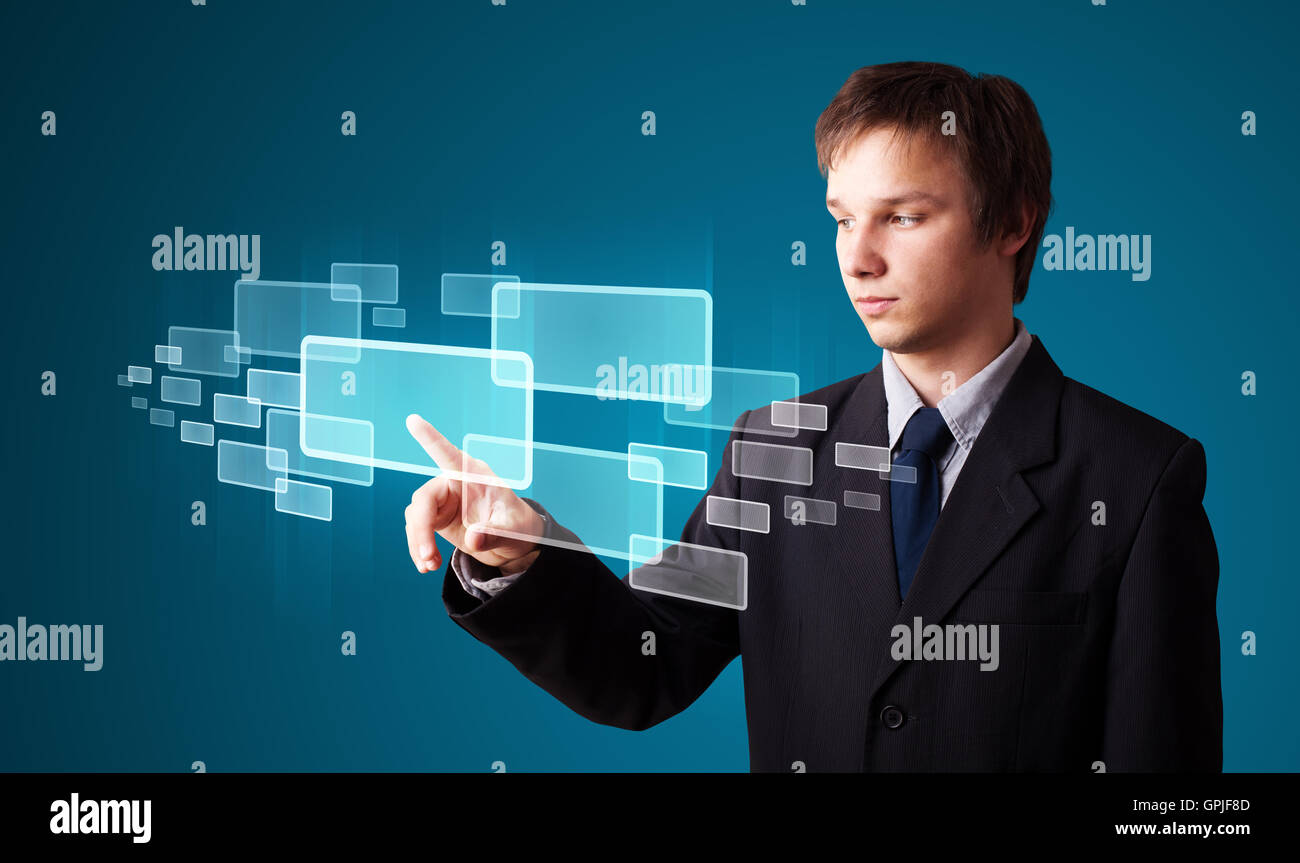 Businessman pressing high tech type of modern buttons Stock Photo - Alamy