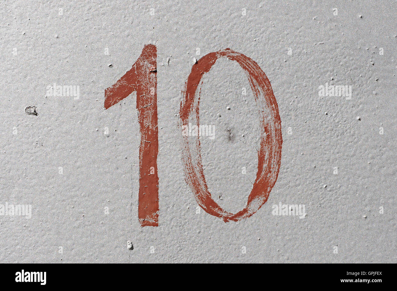 10 - old brown handwritten number over grunge silver background Stock ...