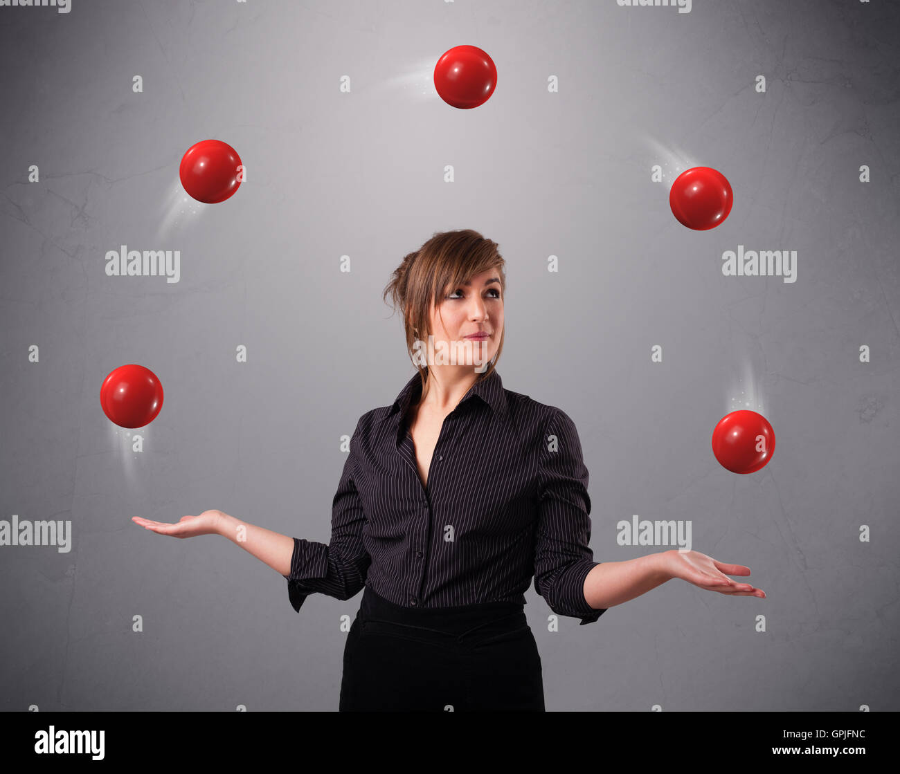 Woman juggling balls hi-res stock photography and images - Alamy