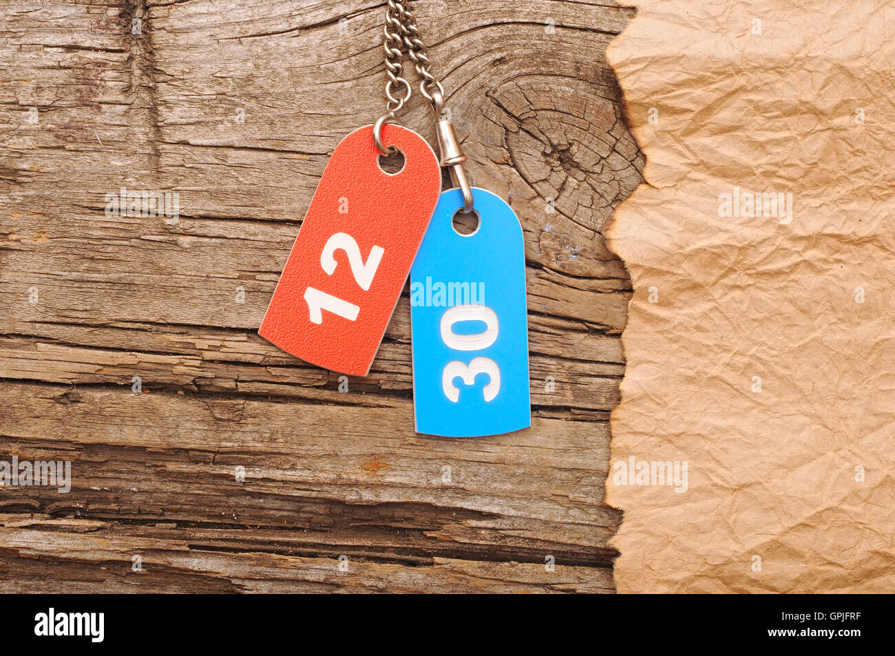 two colorful tags with numbers on vintage background Stock Photo - Alamy