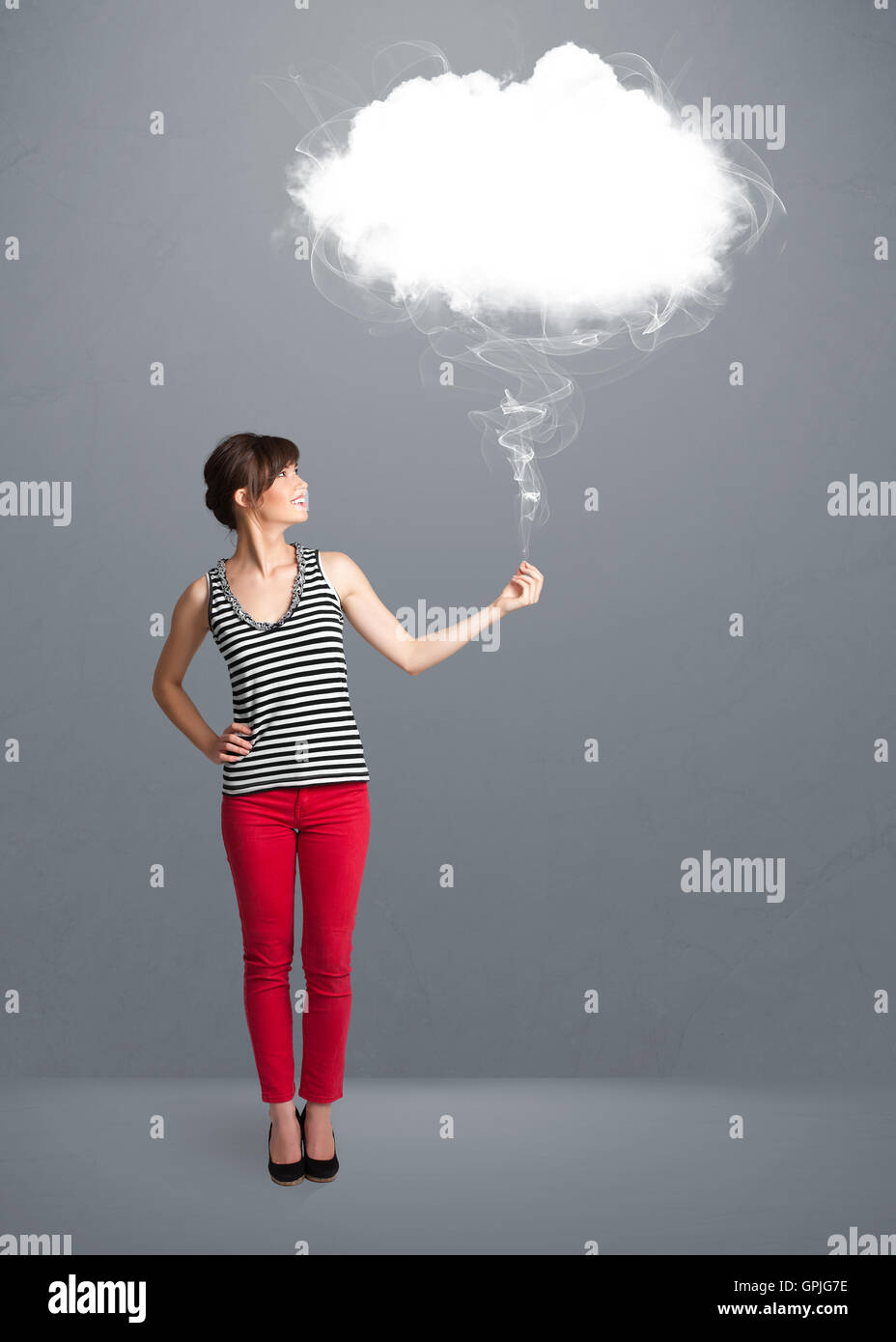 Beautiful lady holding cloud Stock Photo - Alamy