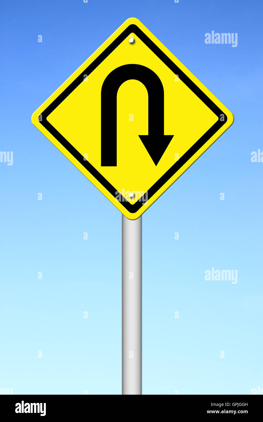Yellow warning sign u-turn roadsign Stock Photo - Alamy