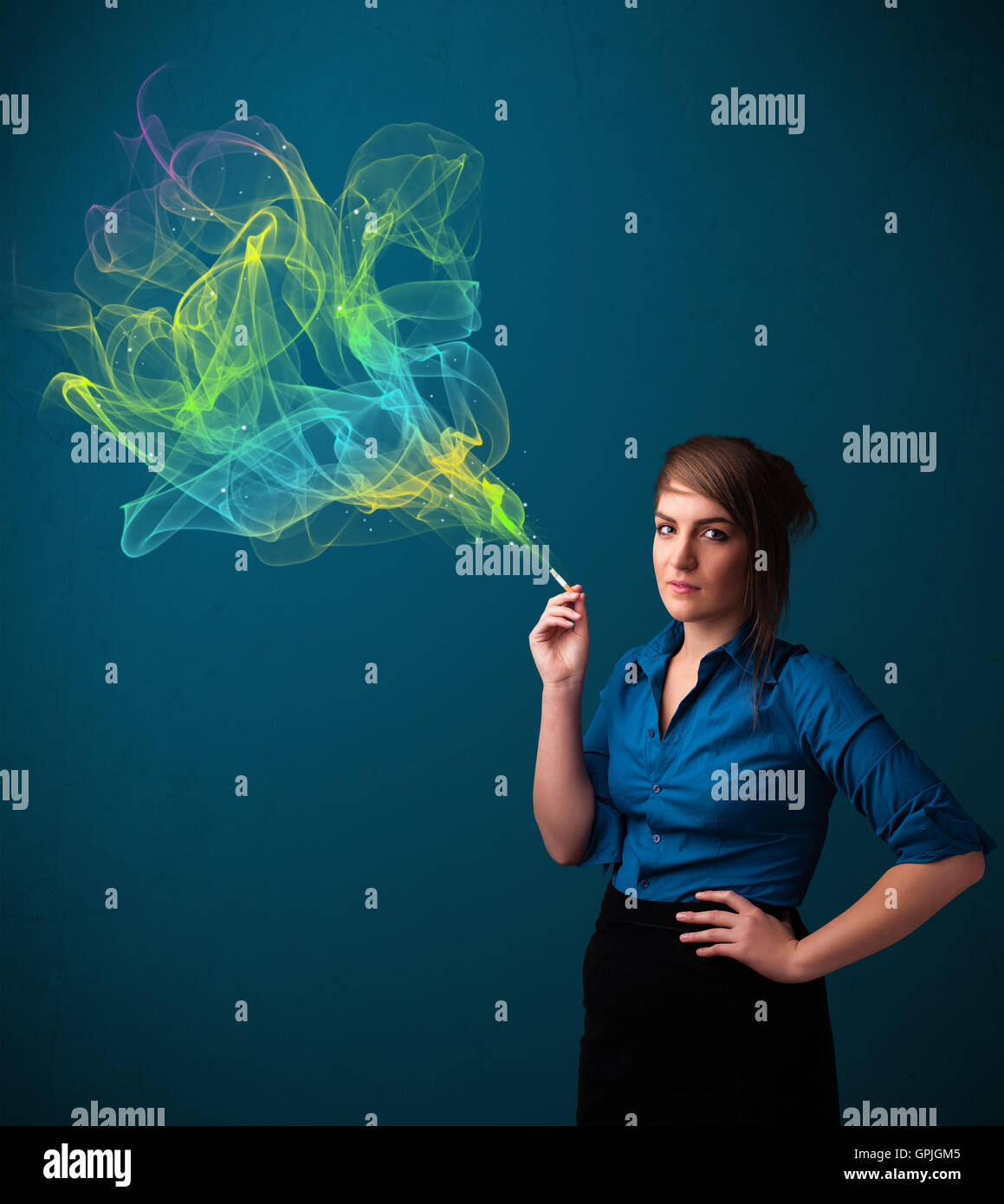 Pretty lady smoking cigarette with colorful smoke Stock Photo - Alamy