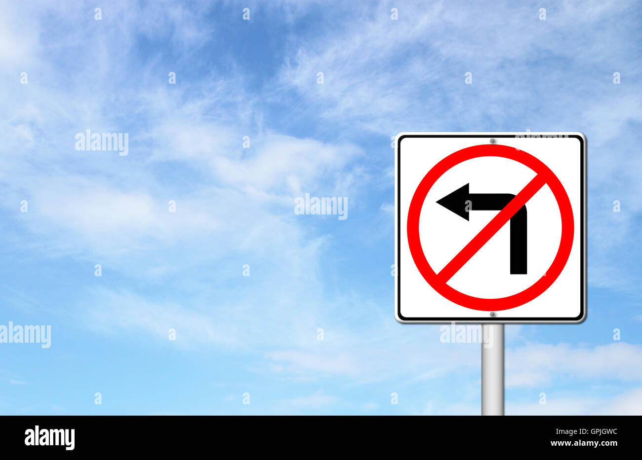 Road sign don't turn left over blue sky Stock Photo - Alamy
