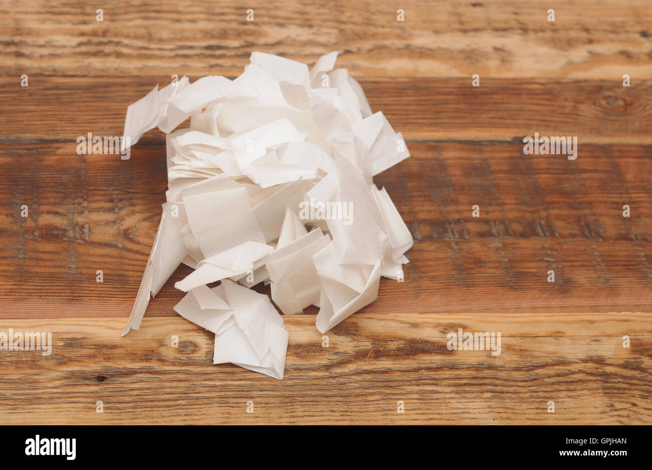 stack of crumpled papers on wooden table Stock Photo - Alamy