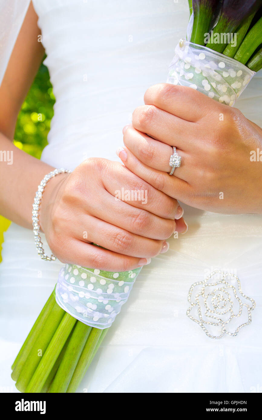 Bride Holding Bouquet Stock Photo - Alamy