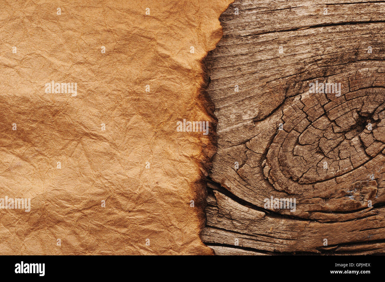 Old paper on brown wood board Stock Photo - Alamy