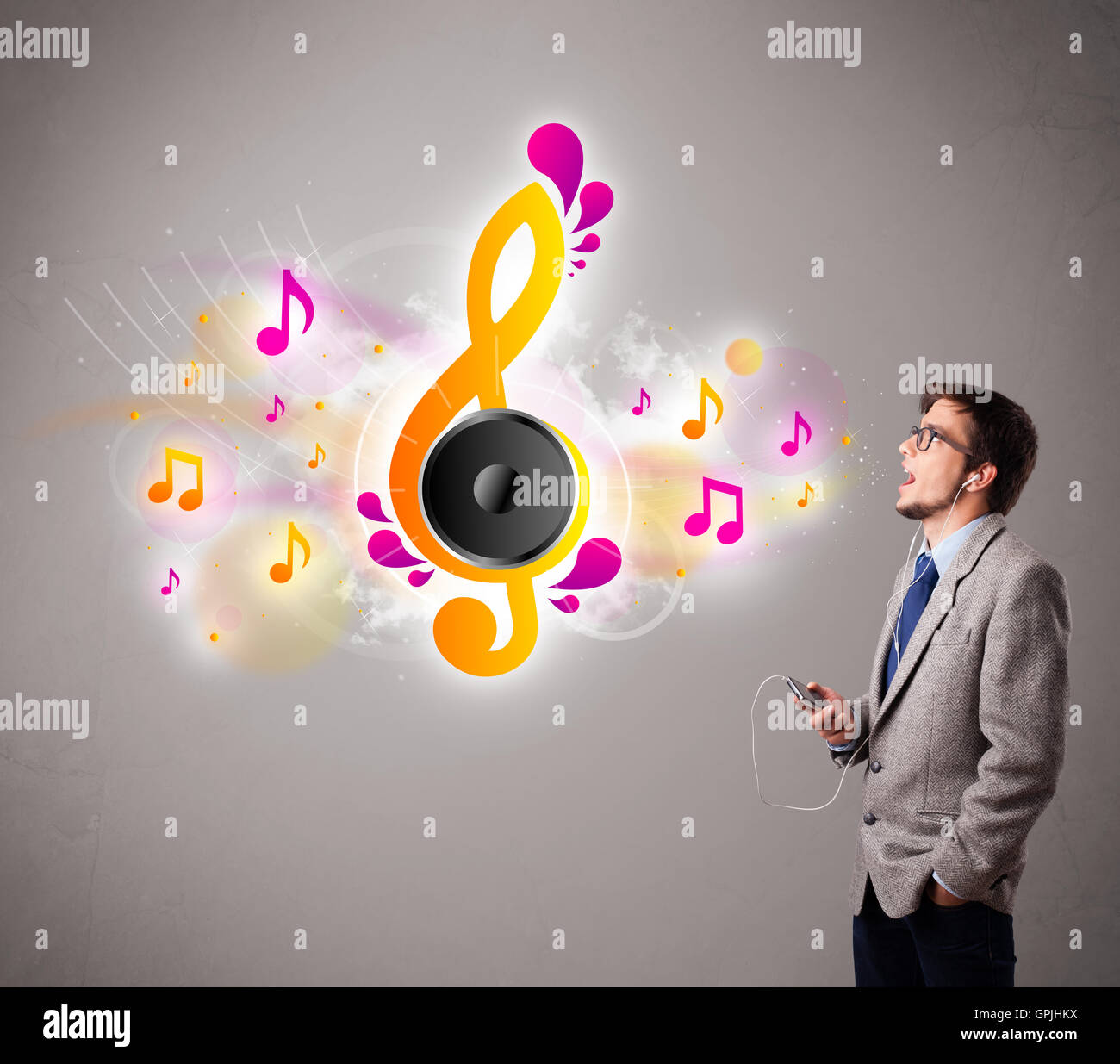 young man singing and listening to music with musical notes Stock Photo ...