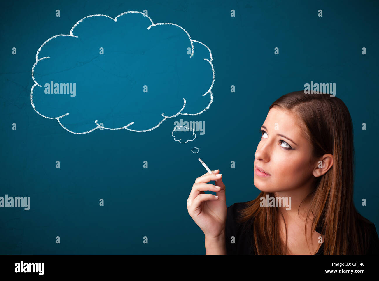 Beautiful lady smoking cigarette with idea cloud Stock Photo - Alamy