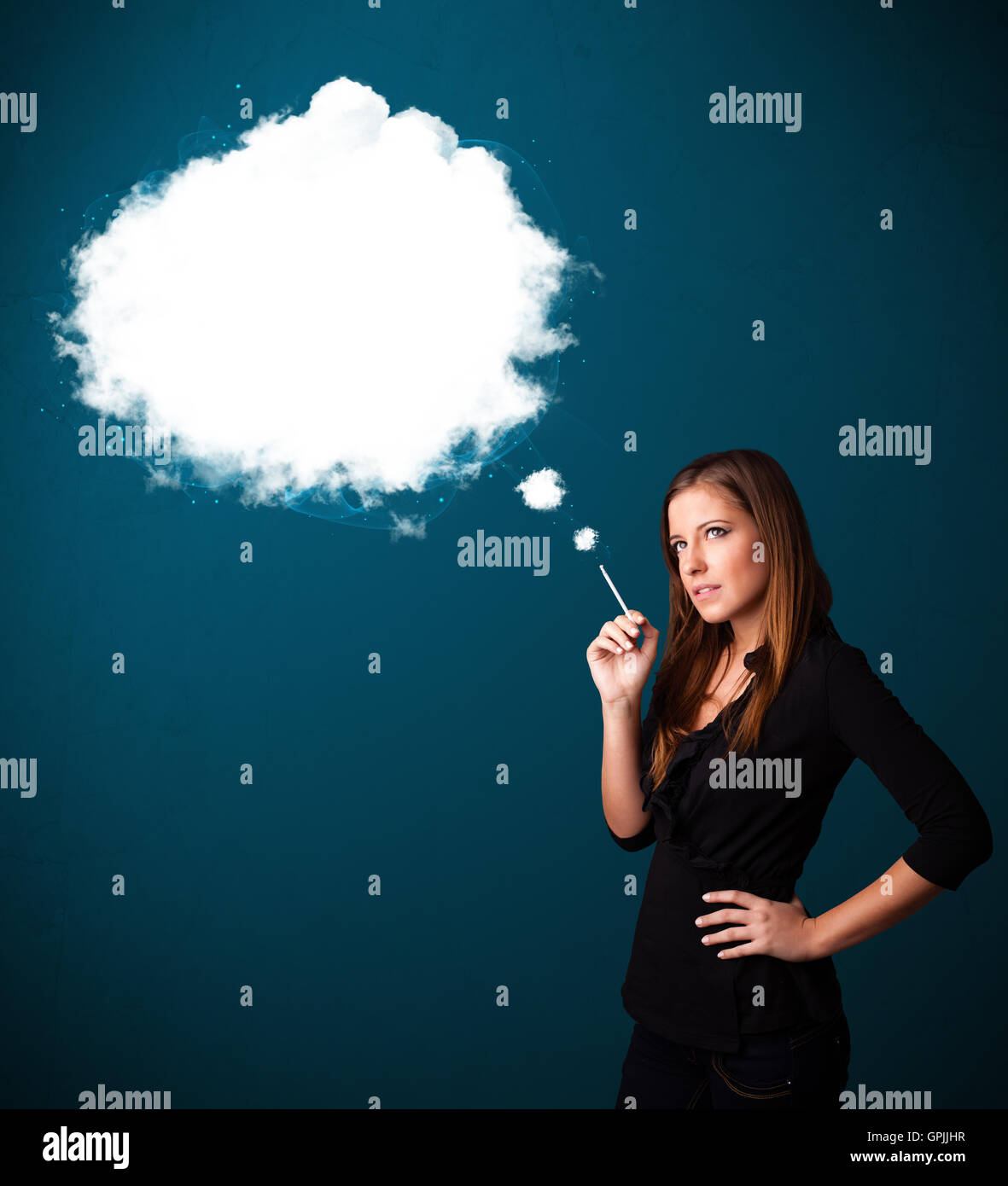 Young woman smoking unhealthy cigarette with dense smoke Stock Photo ...