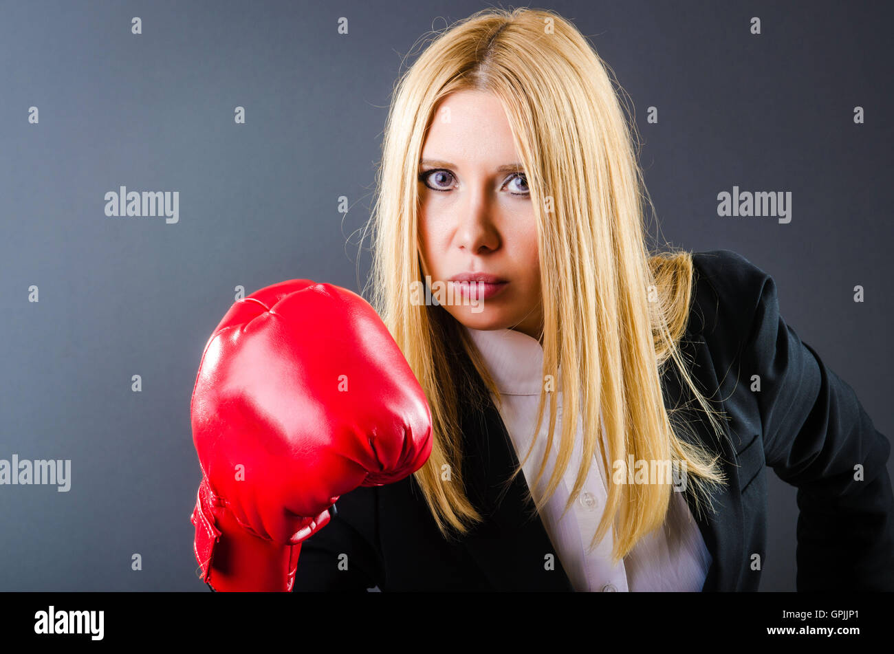 Woman boxer in dark room Stock Photo - Alamy