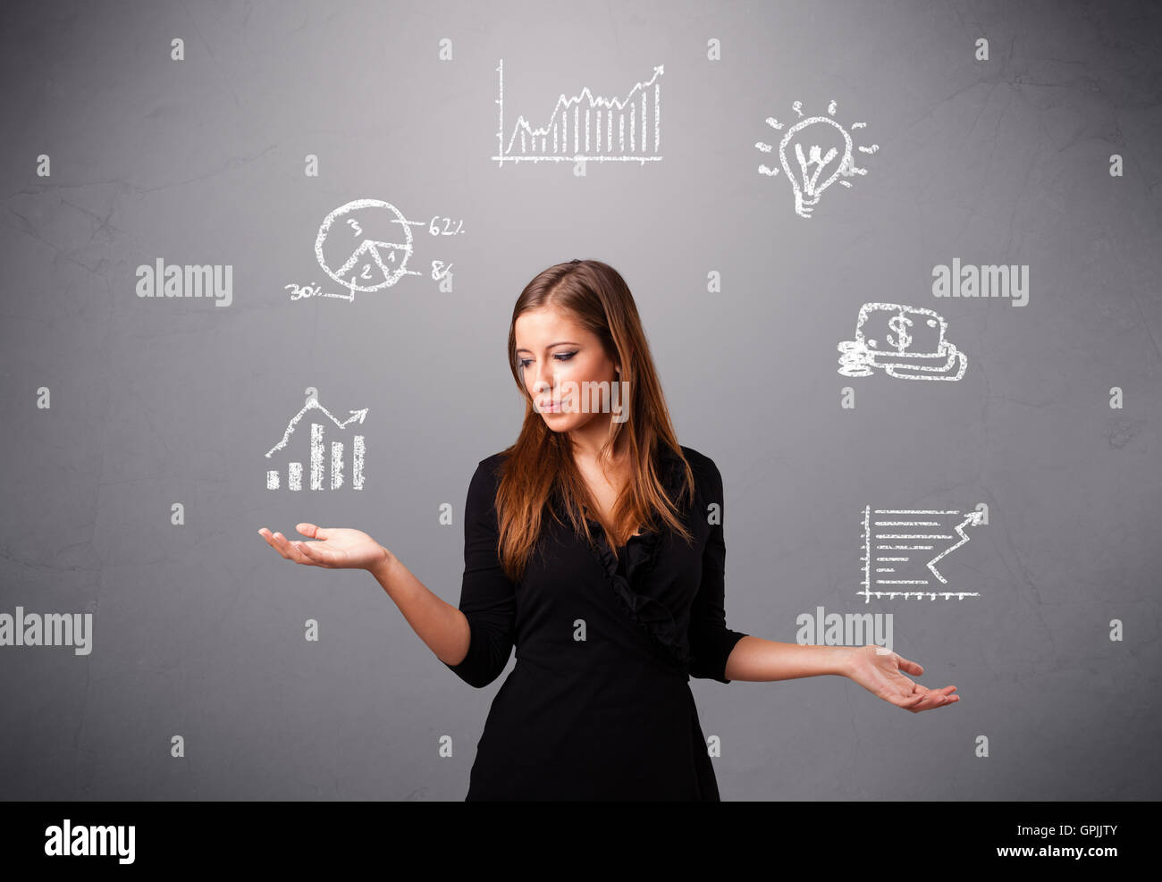 beautiful young woman juggling with statistics and graphs Stock Photo ...
