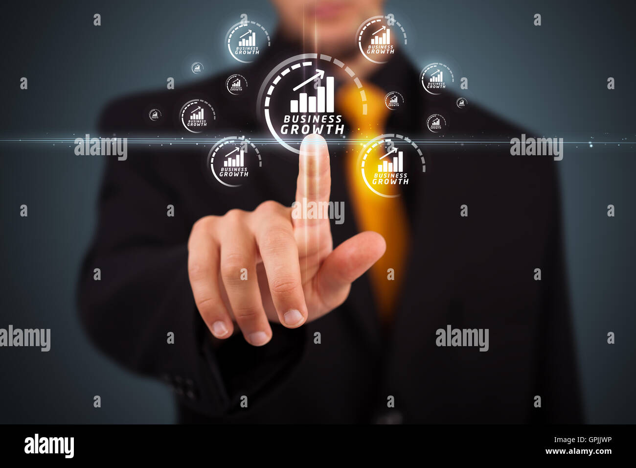 Businessman pressing modern business type of buttons Stock Photo - Alamy