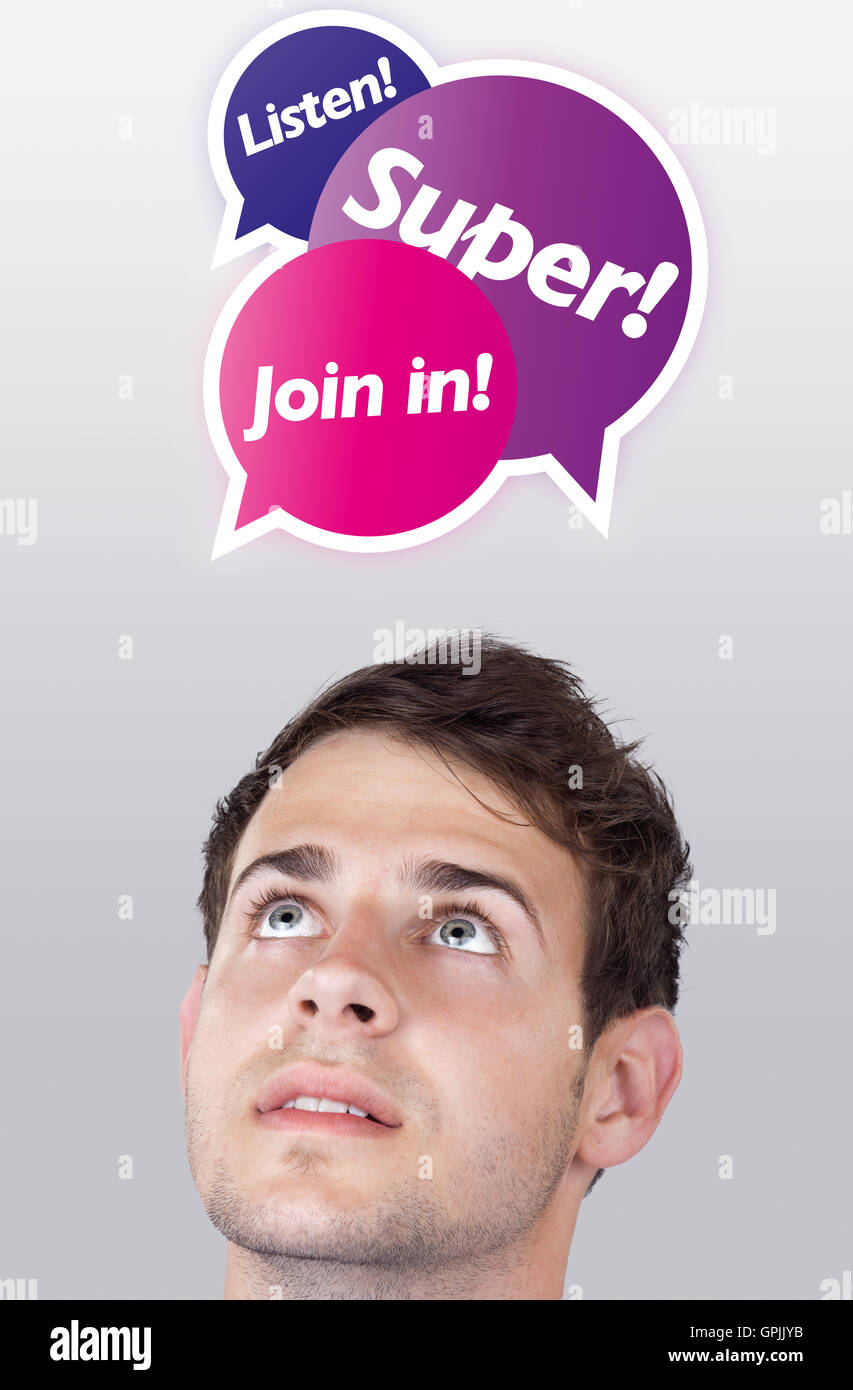 Young head looking at internet type of icons Stock Photo - Alamy