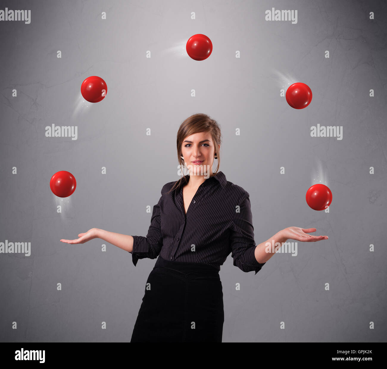 Woman juggling balls hi-res stock photography and images - Alamy