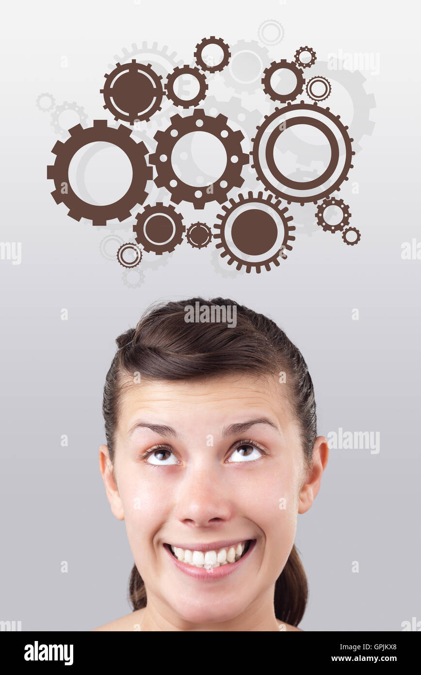 Young girl looking at idea type of sign Stock Photo - Alamy