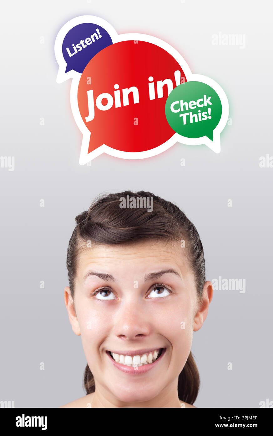 Young girl looking at internet type of icons Stock Photo - Alamy