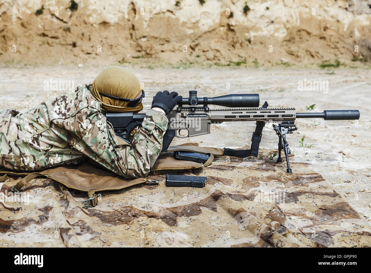 sniper in the desert Stock Photo - Alamy