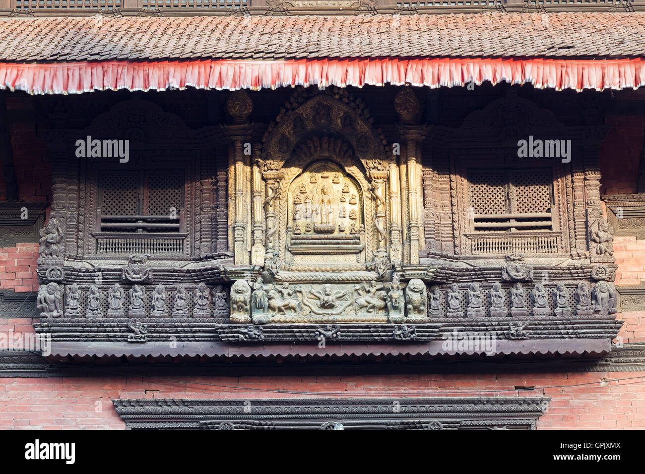 Beautifully carved wooden windows above the entrance to Keshav Narayan ...