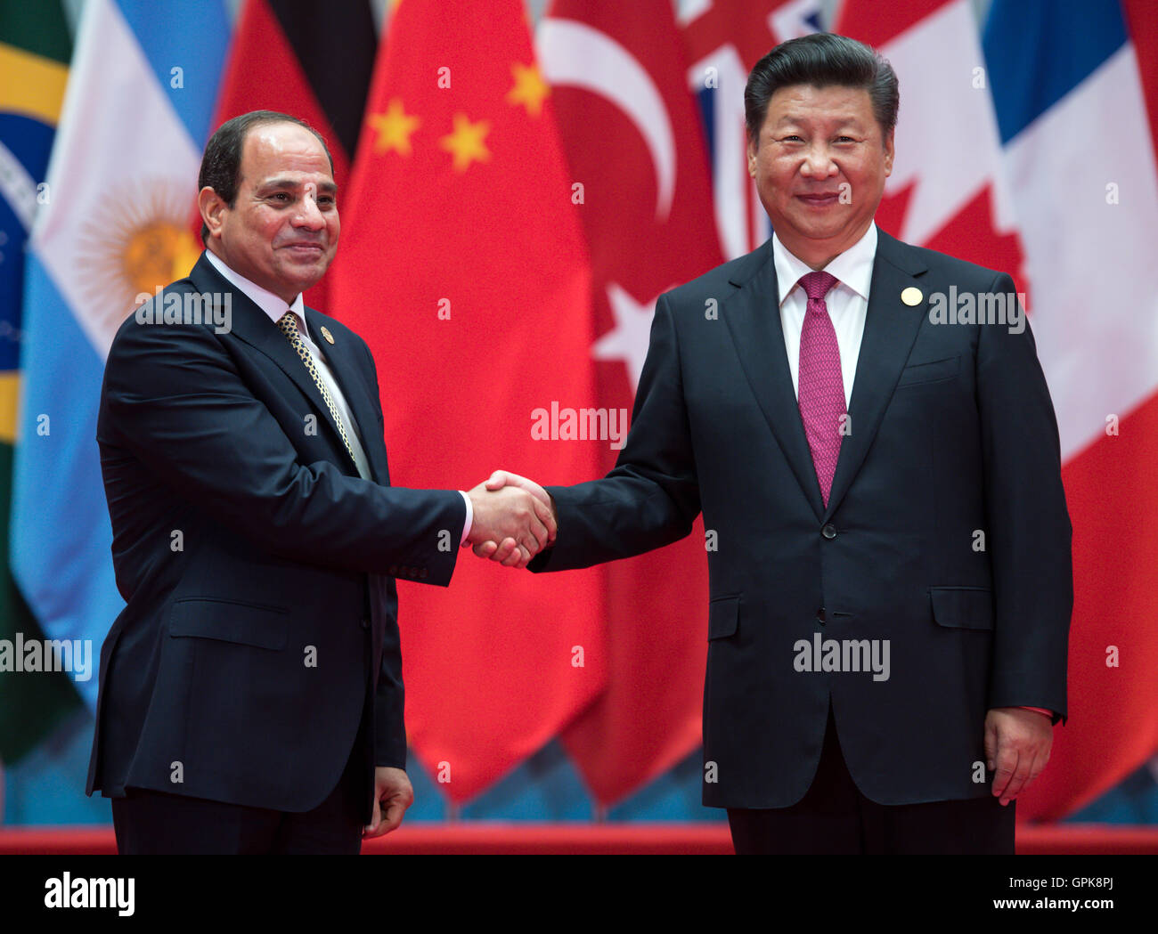 Egyptian President Abdel Fattah al-Sisi (l) being welcomed by Chinese ...