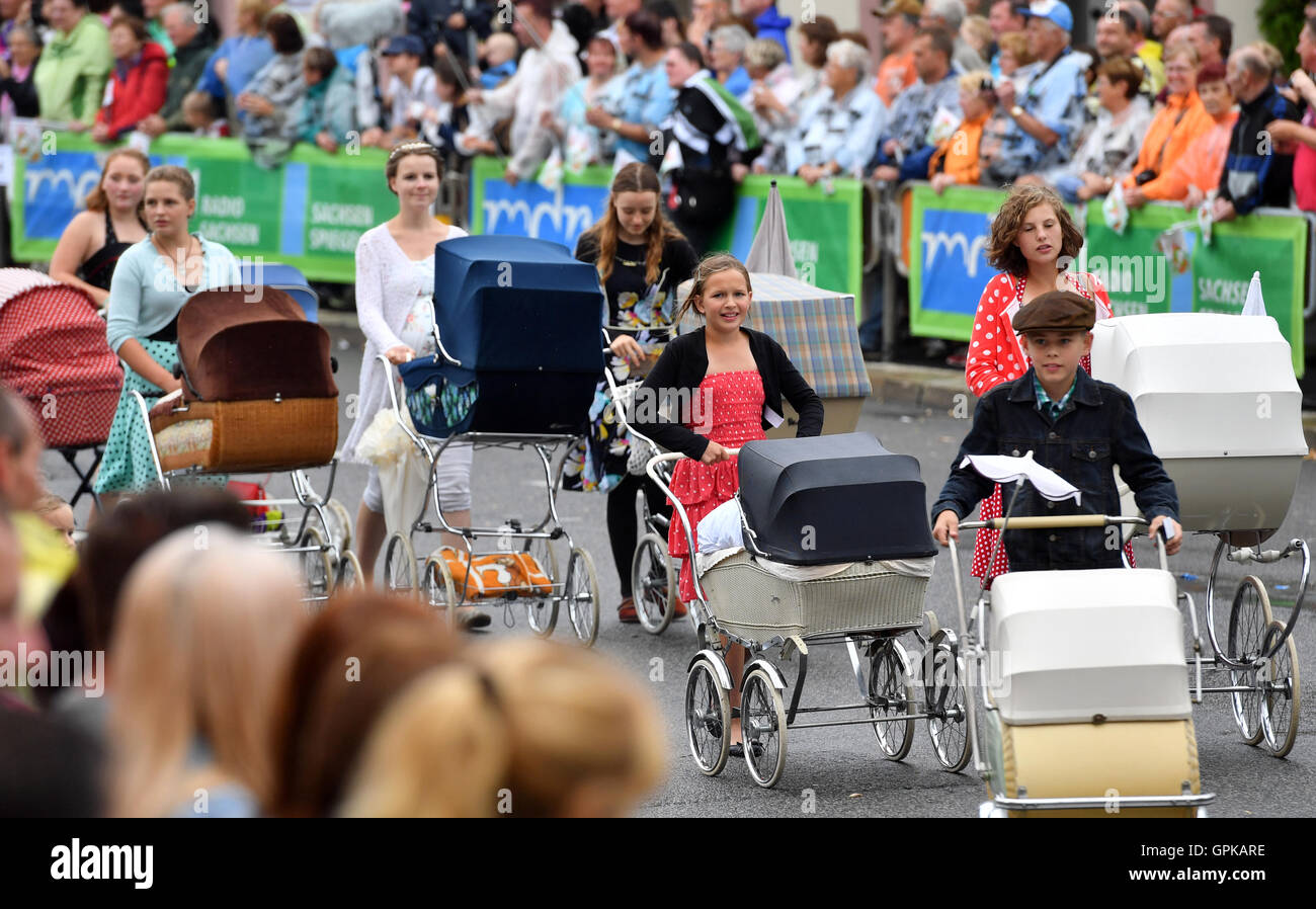 Children and teenagers with buggies participating in the grand festival ...