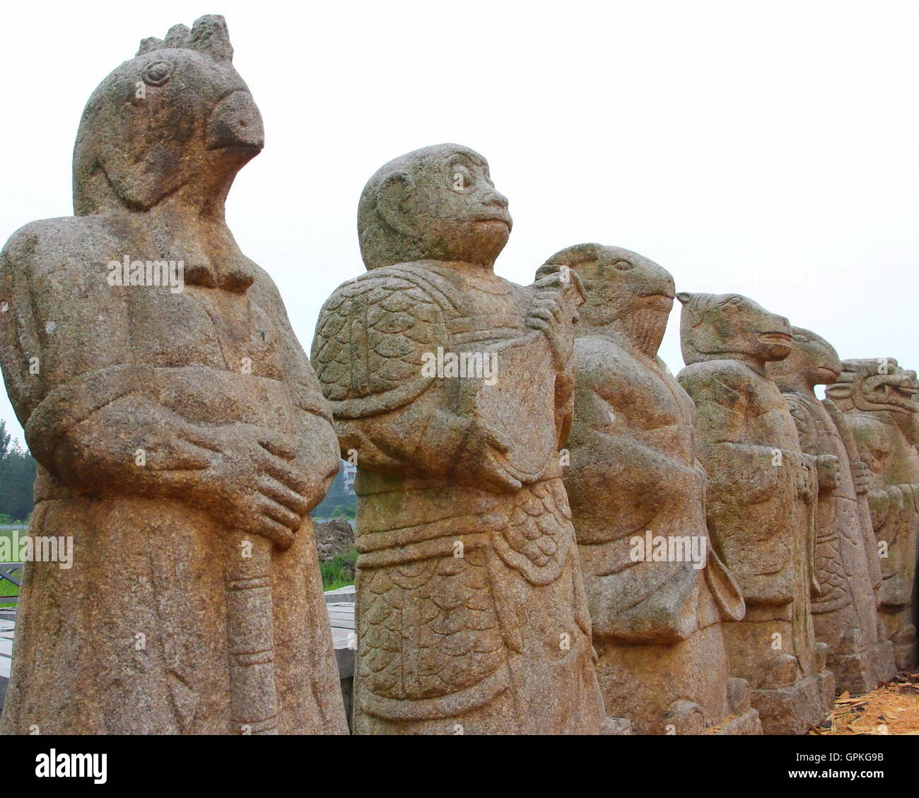 Twelve ancient stone statues of Chinese Zodiac animals at a ...