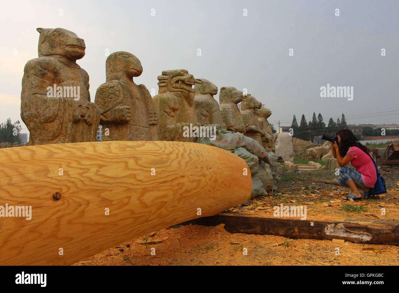 Twelve ancient stone statues of Chinese Zodiac animals at a ...