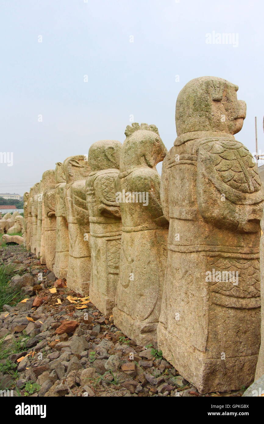 Twelve ancient stone statues of Chinese Zodiac animals at a ...