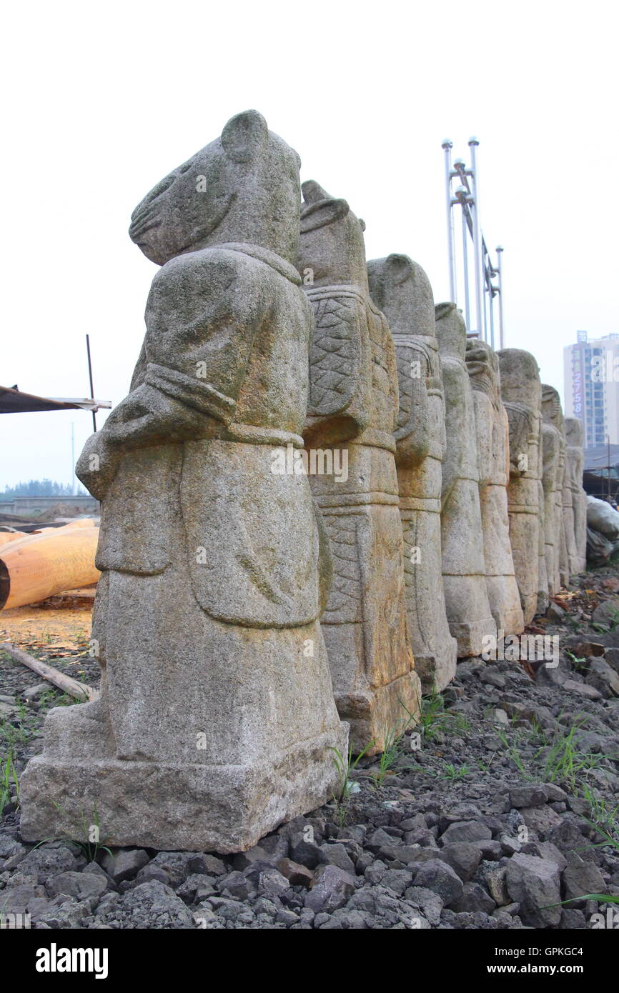 Twelve ancient stone statues of Chinese Zodiac animals at a ...