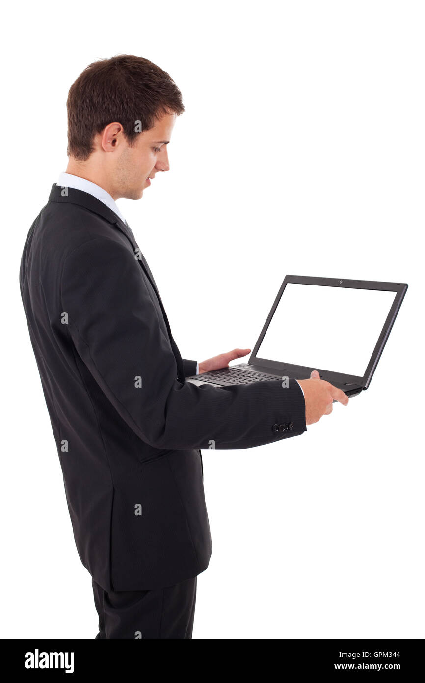 Young businessman holding laptop Stock Photo - Alamy