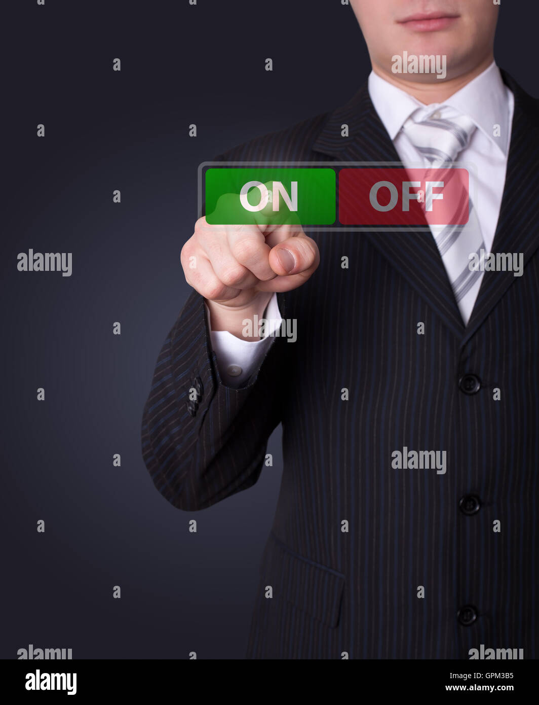 Man pressing ON / OFF button Stock Photo - Alamy