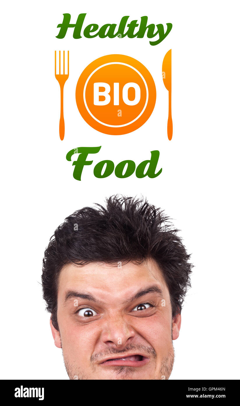 Young head looking at healthy food sign Stock Photo - Alamy