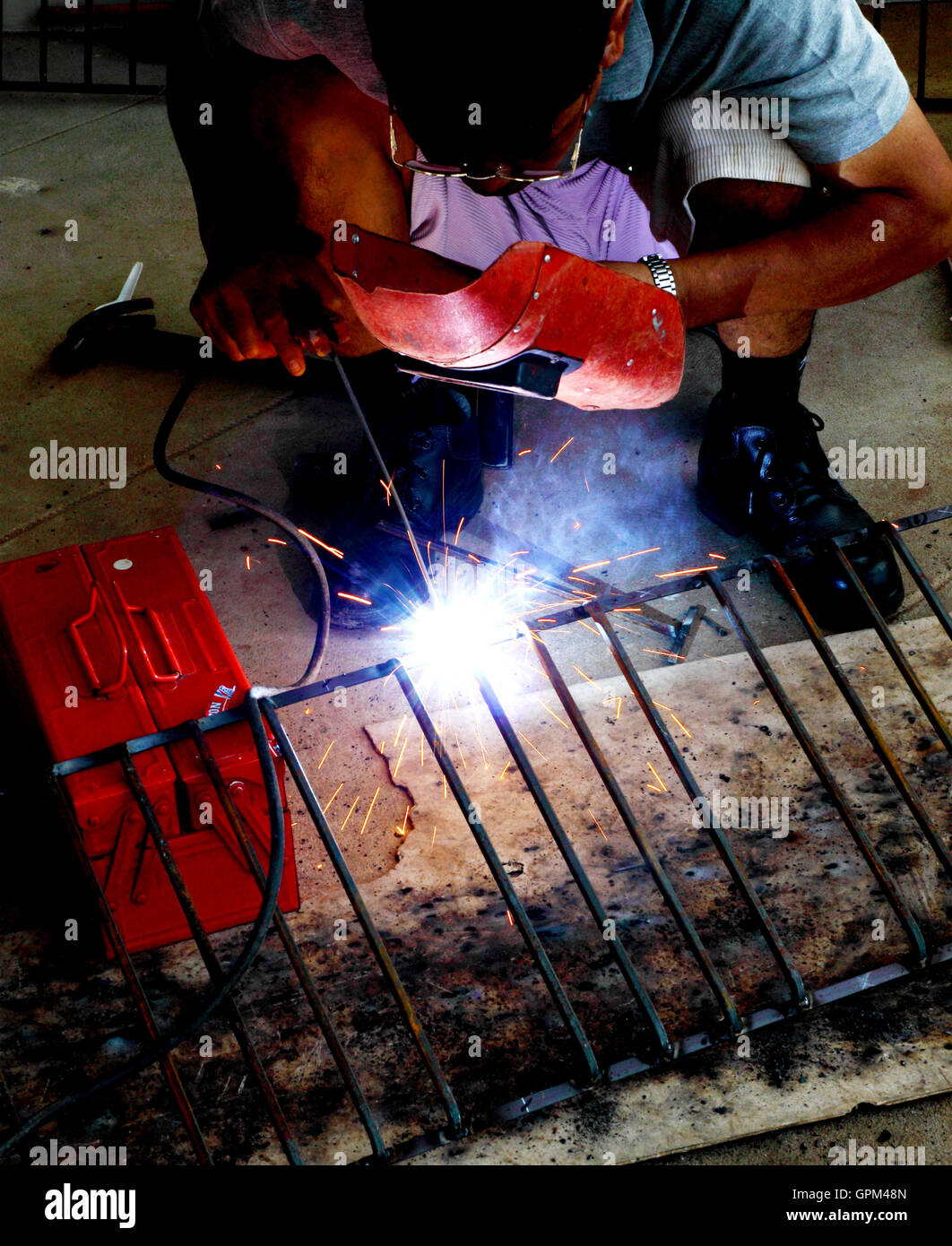 electric welding connecting square bar Stock Photo - Alamy
