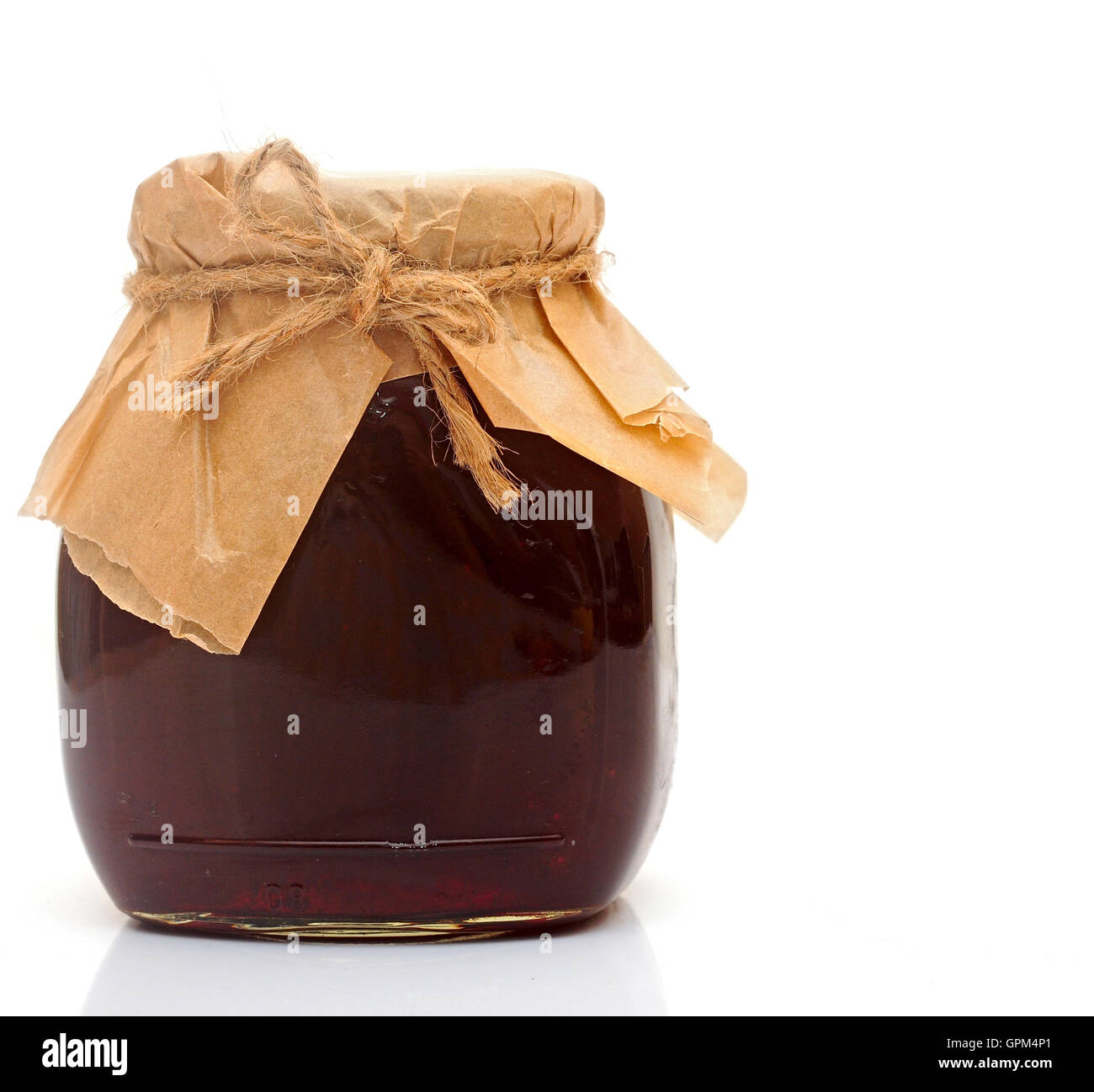Strawberry jam isolated on white Stock Photo - Alamy