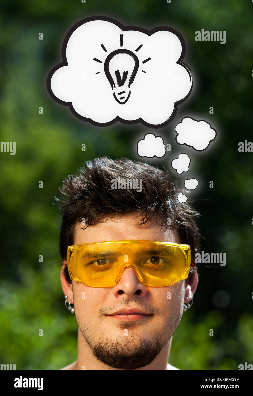 Young head thinking with clouds Stock Photo - Alamy