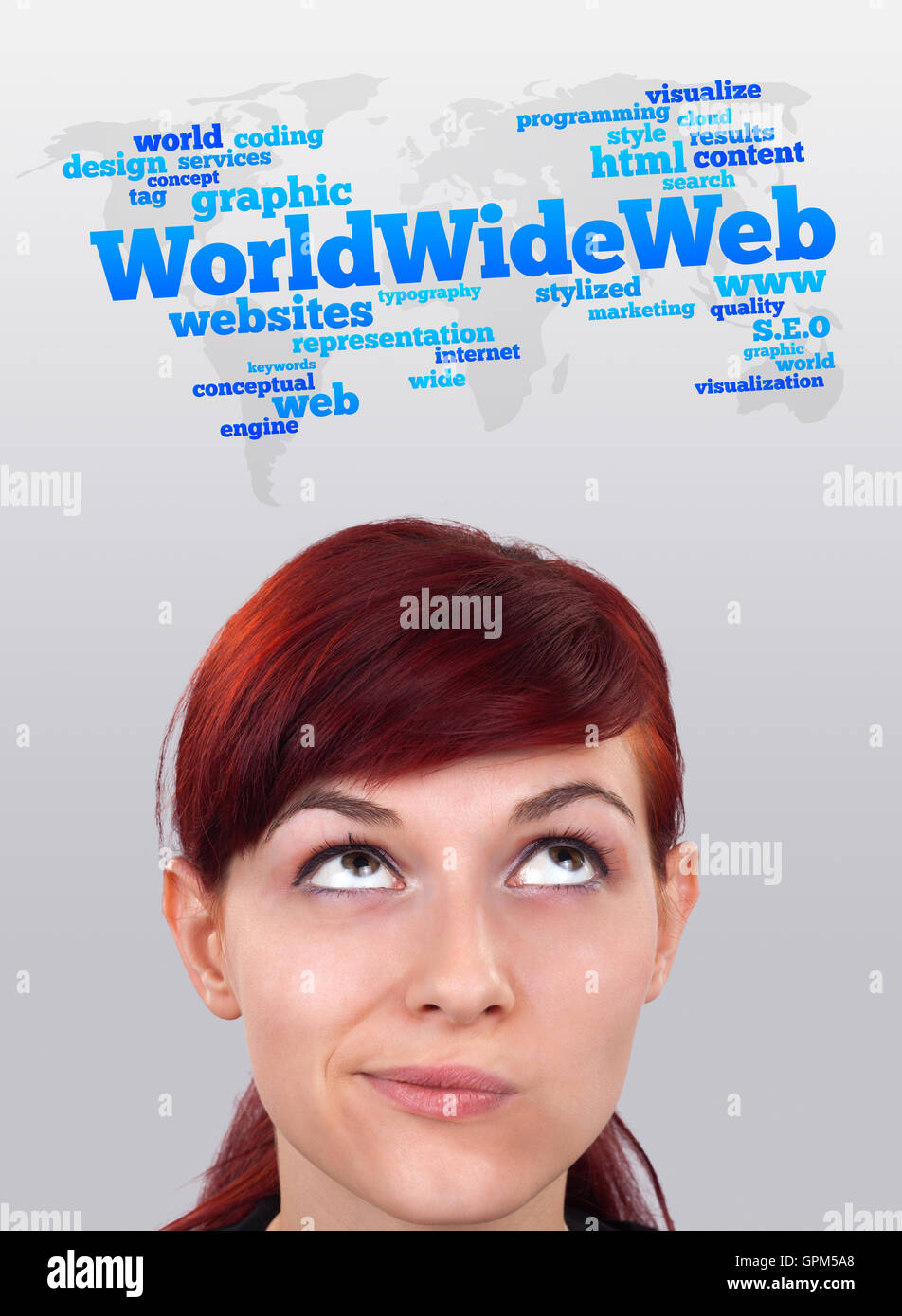 Young girl looking at internet type of icons Stock Photo - Alamy