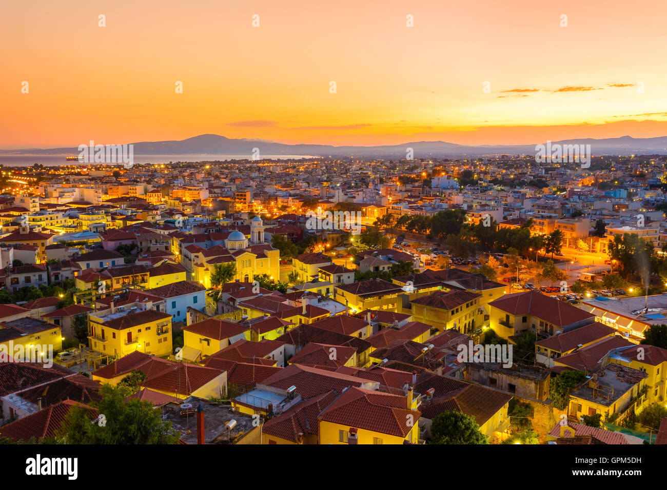 Kalamata city skyline in the evening after sunset with city lights in ...