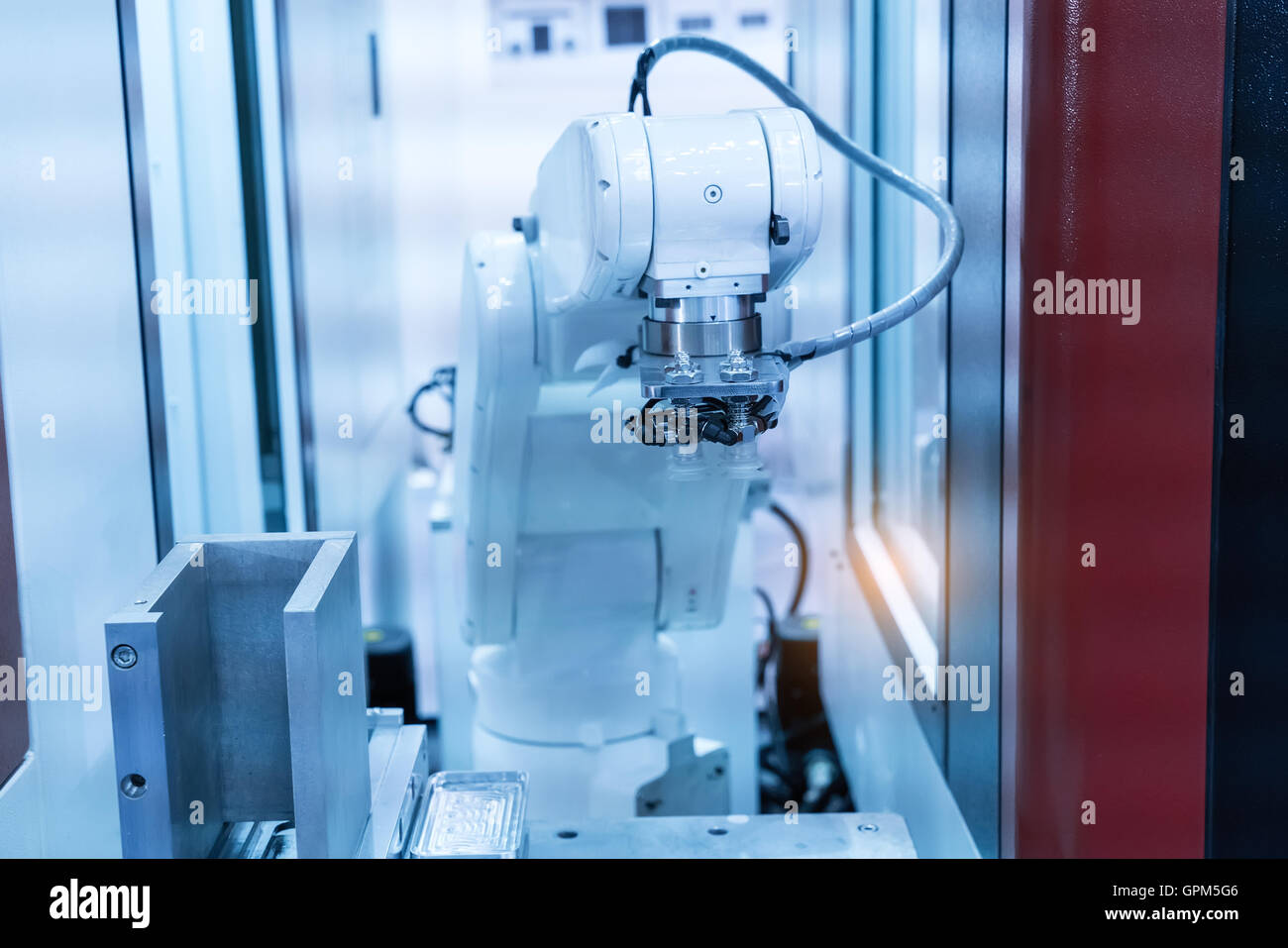 Industrial robot working in factory,Controler of robotic hand Stock ...